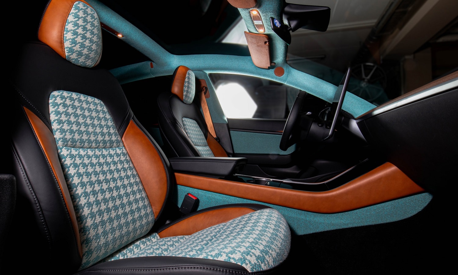 The interior of the Tesla Model 3 is filled with color thanks to the ...